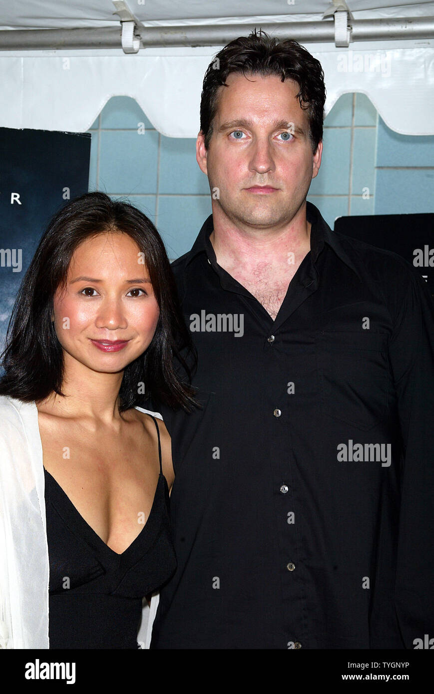 Writer/Director Chris Kentis and producer Laura Lau pose for pictures ...