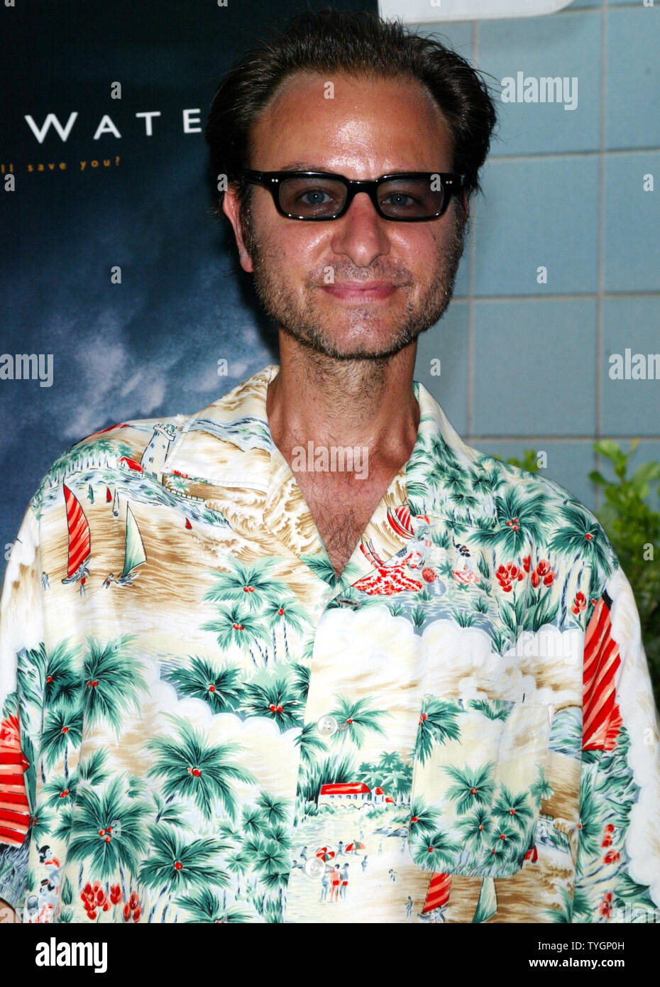 Fisher Stevens poses for pictures at the screening of "Open Water" at ...