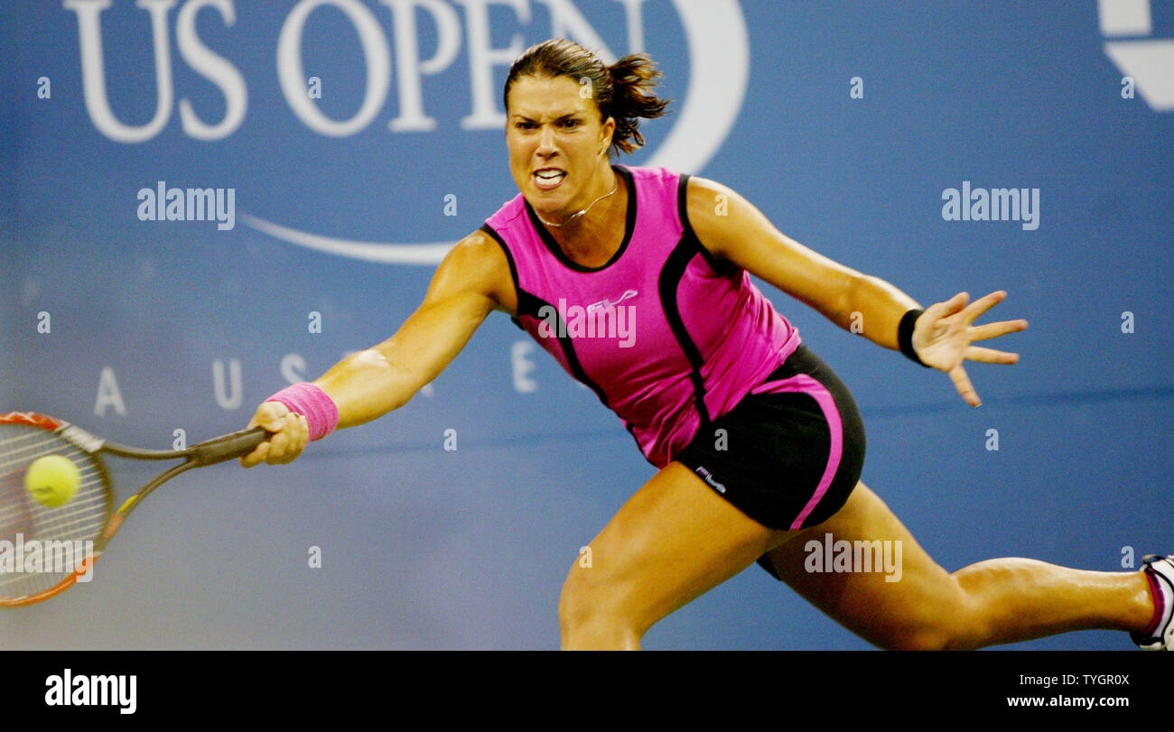 Jennifer Capriati, who is the eighth seed, returns the serve to third ...