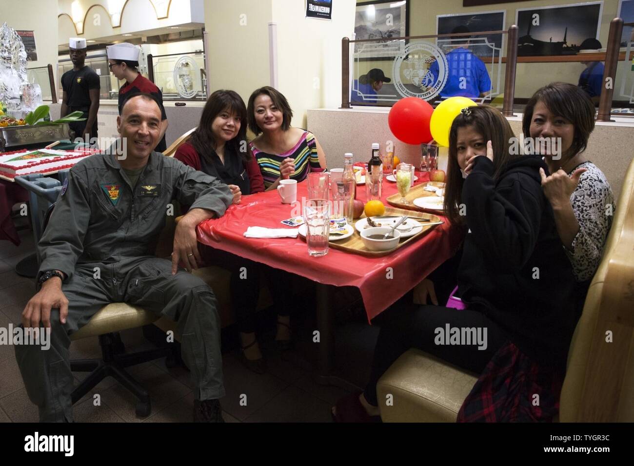 Col. Peter Lee poses for a photo with master labor contractors during ...