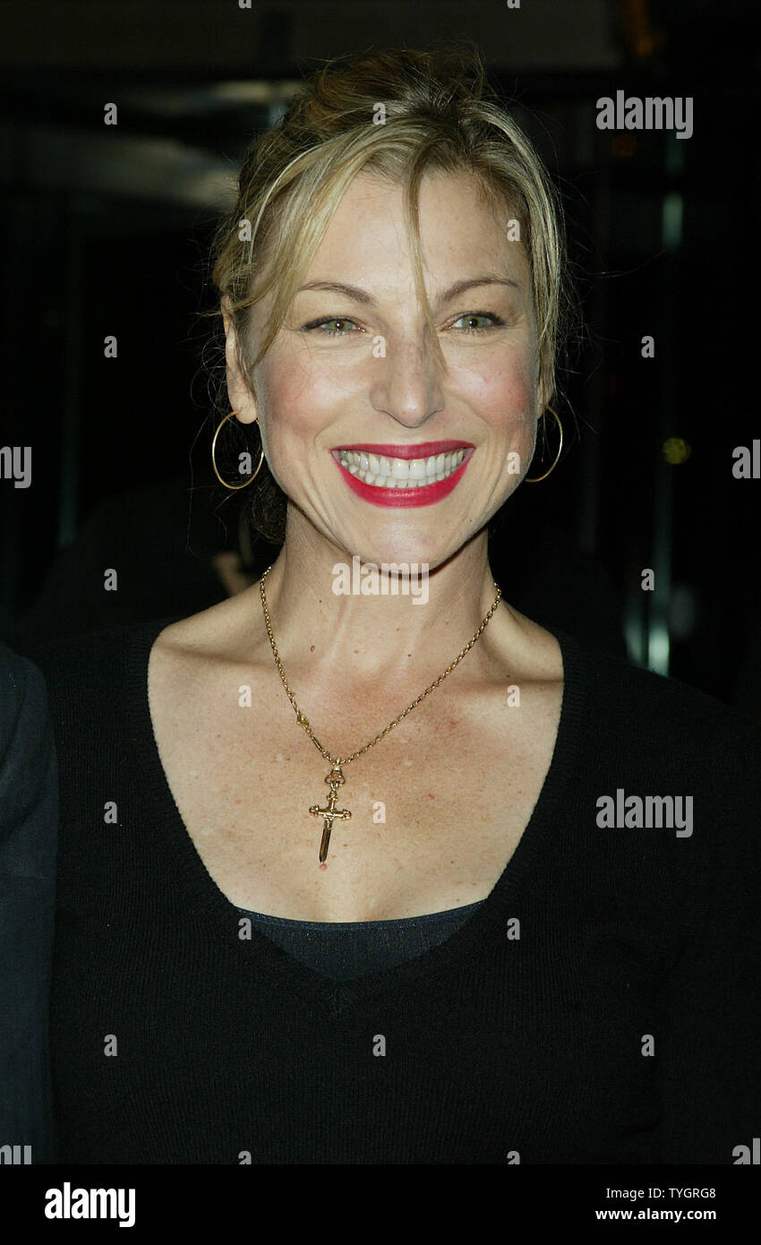 Tatum O'Neal poses for pictures at the Coty 100th Anniversary ...