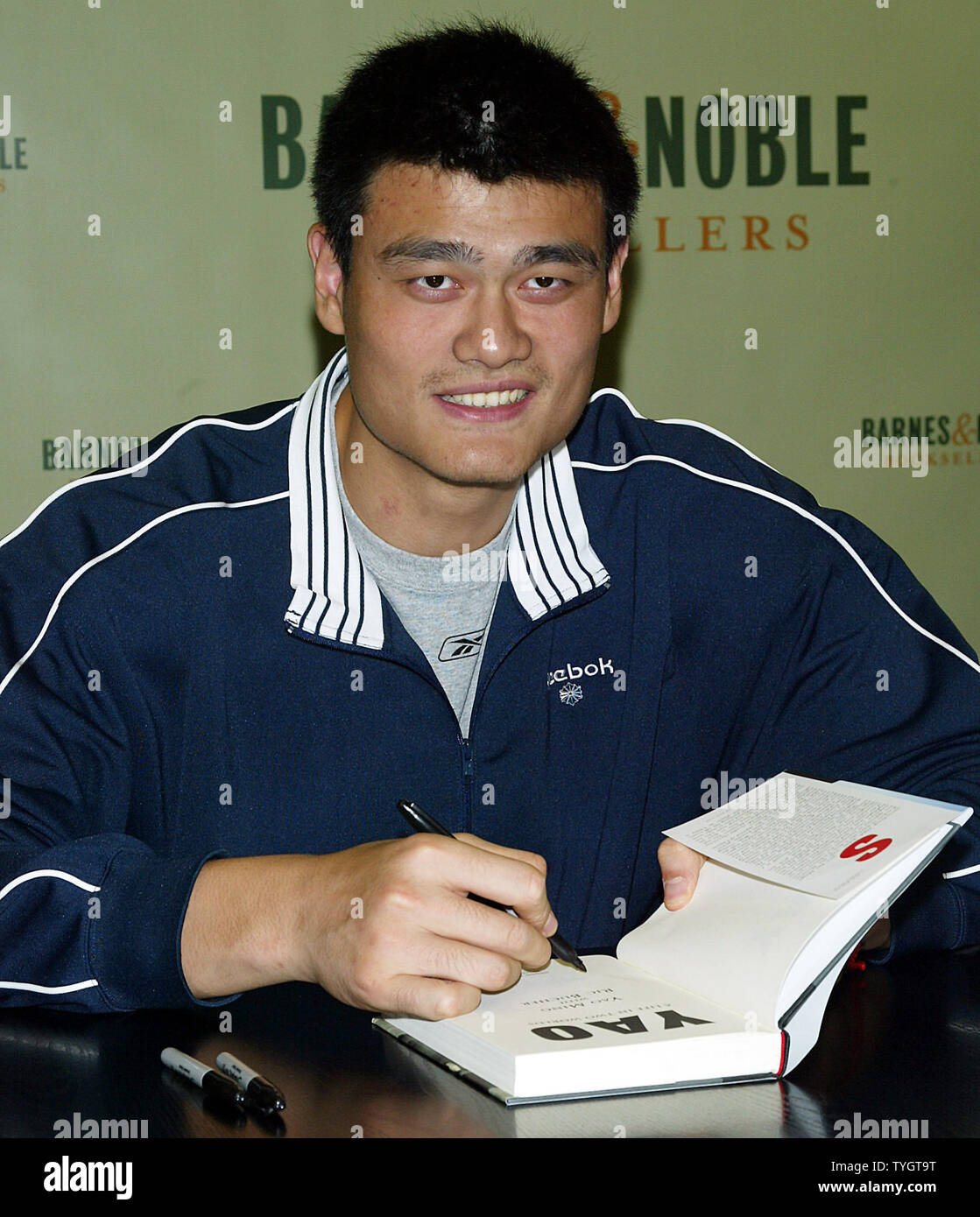 Yao Ming signs copies of his new book "Yao: A Life in Two Worlds" at ...