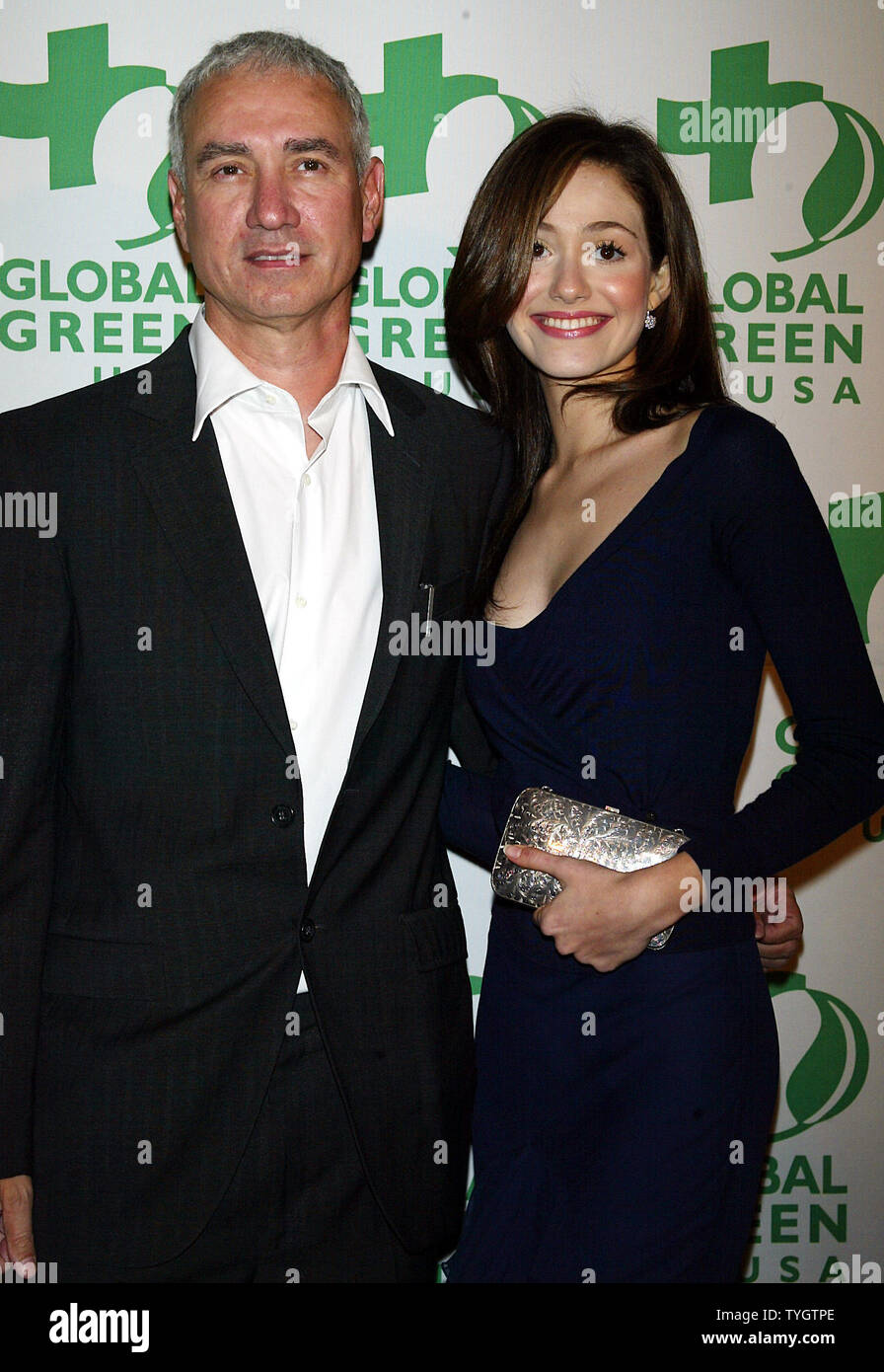Roland Emmerich and Emmy Rossum pose for pictures at the 10th ...