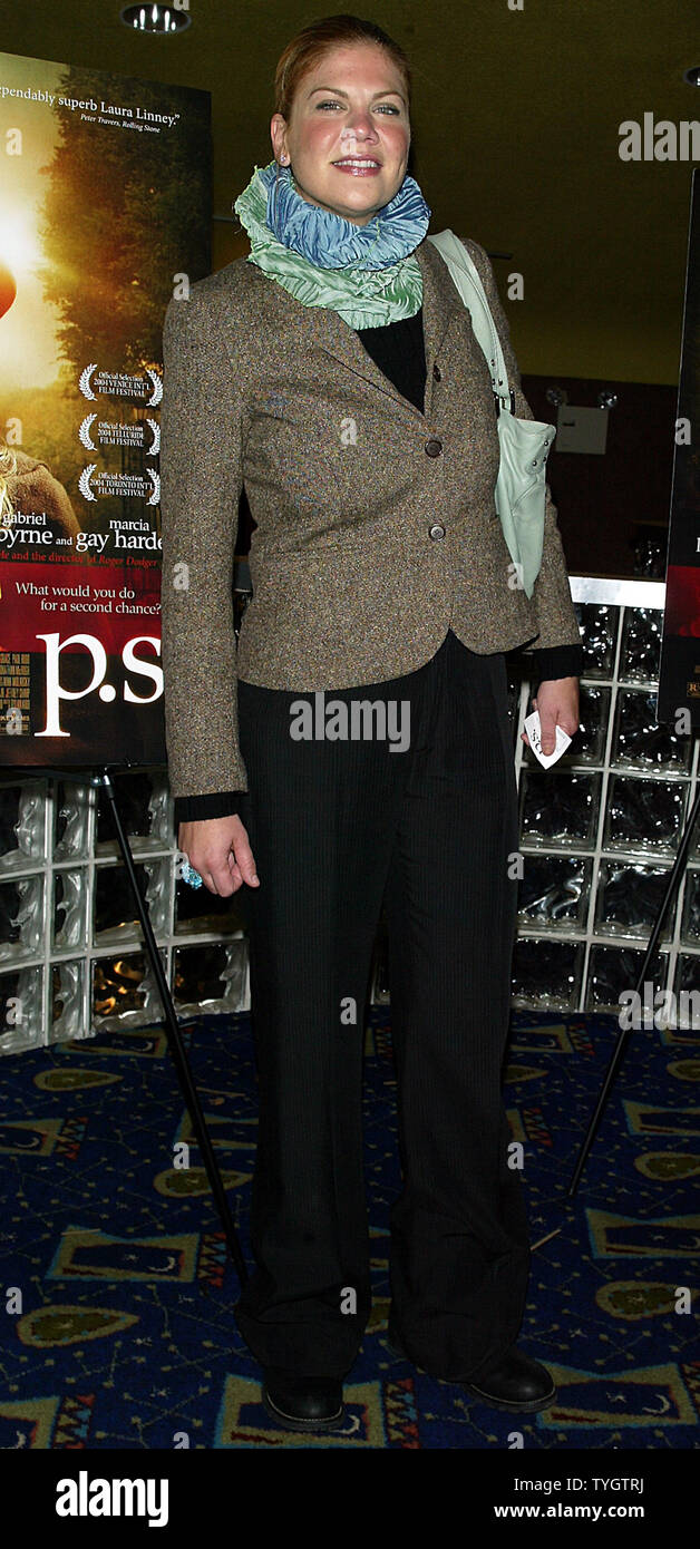 Kristen Johnson poses for pictures at the premiere of "p.s." at the ...