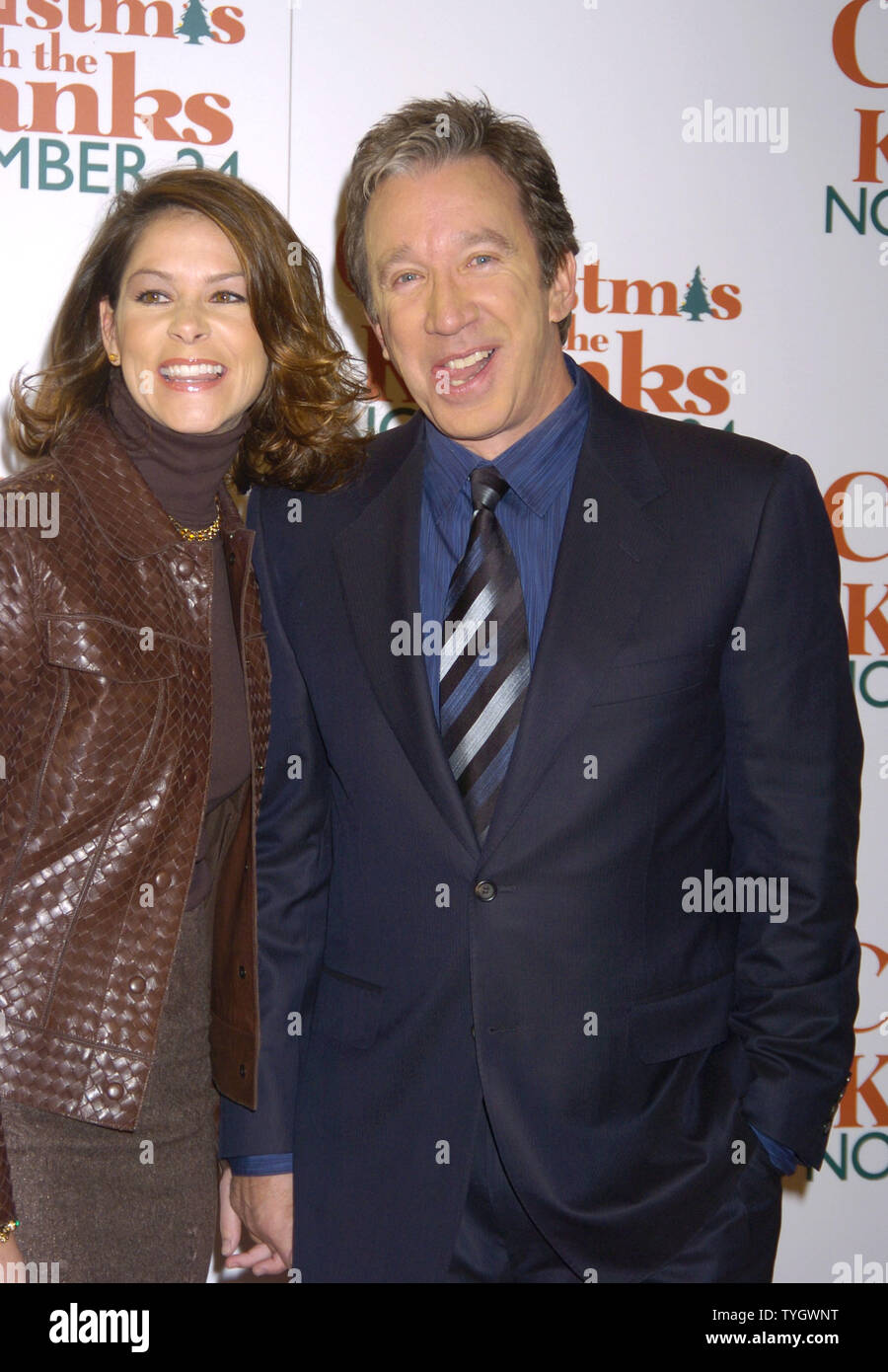 Tim Allen and girlfriend Jane Hajduk pose for photographers at the ...