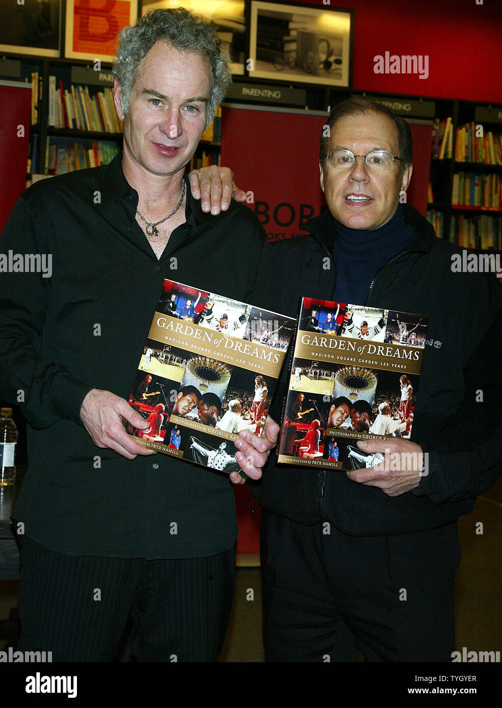 George Kalinsky (right) signs copies of his new book "Garden Of Dreams ...