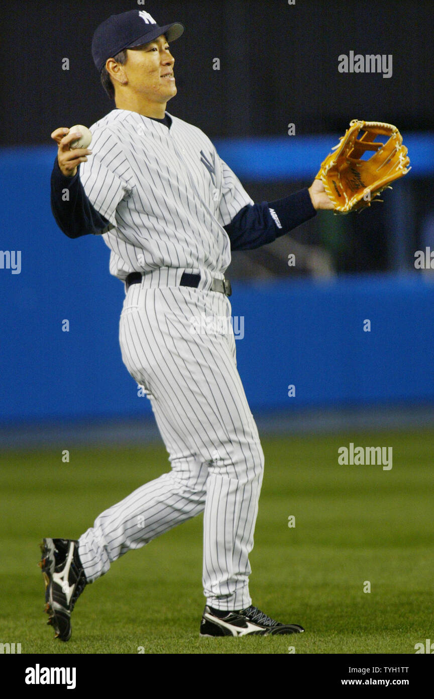 New York Yankees' outfielder Hideki Matsui warms up before the start of ...