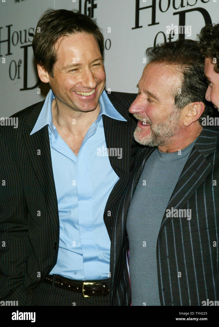 Robin Williams (right) and David Duchovny arrive for the premiere of ...
