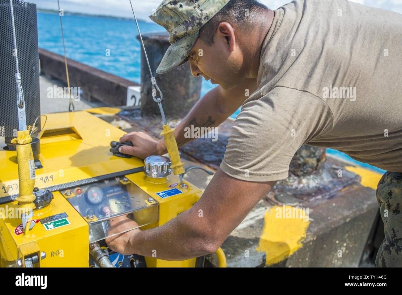 Petty Officer 1st Class Hector Alvarado, assigned to Underwater ...