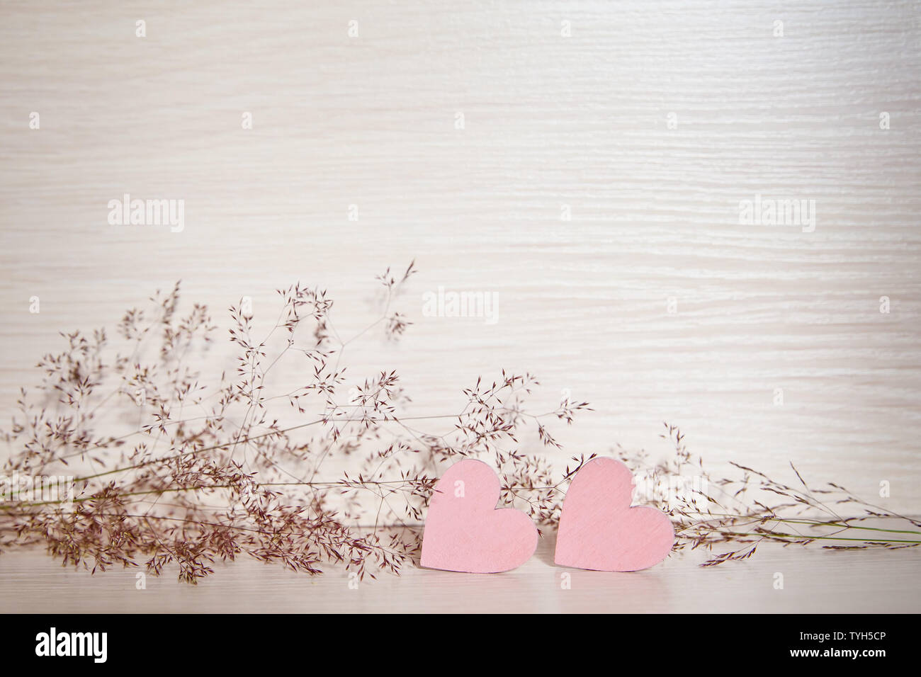 Two hearts, background for greetings on Valentine's Day. Wooden hearts ...