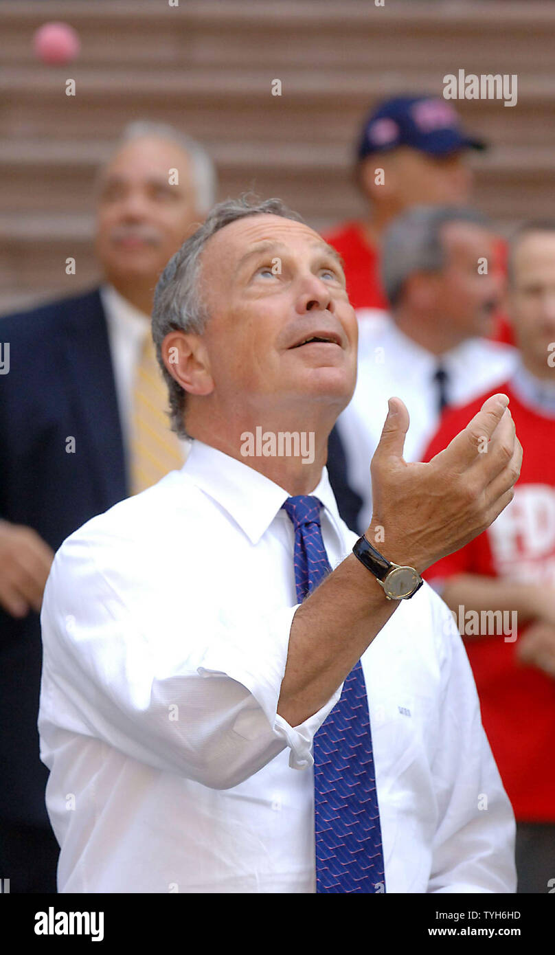 Is the ball infront or behind New York City's Mayor Michael Bloomberg ...