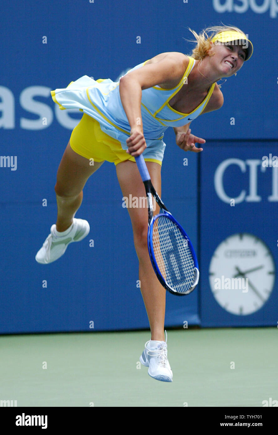 Maria Sharapova (RUS) hits a serve in her 2nd round match against Dally ...