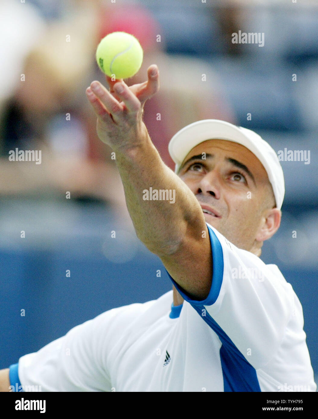 Andre agassi serves during match hi-res stock photography and images ...