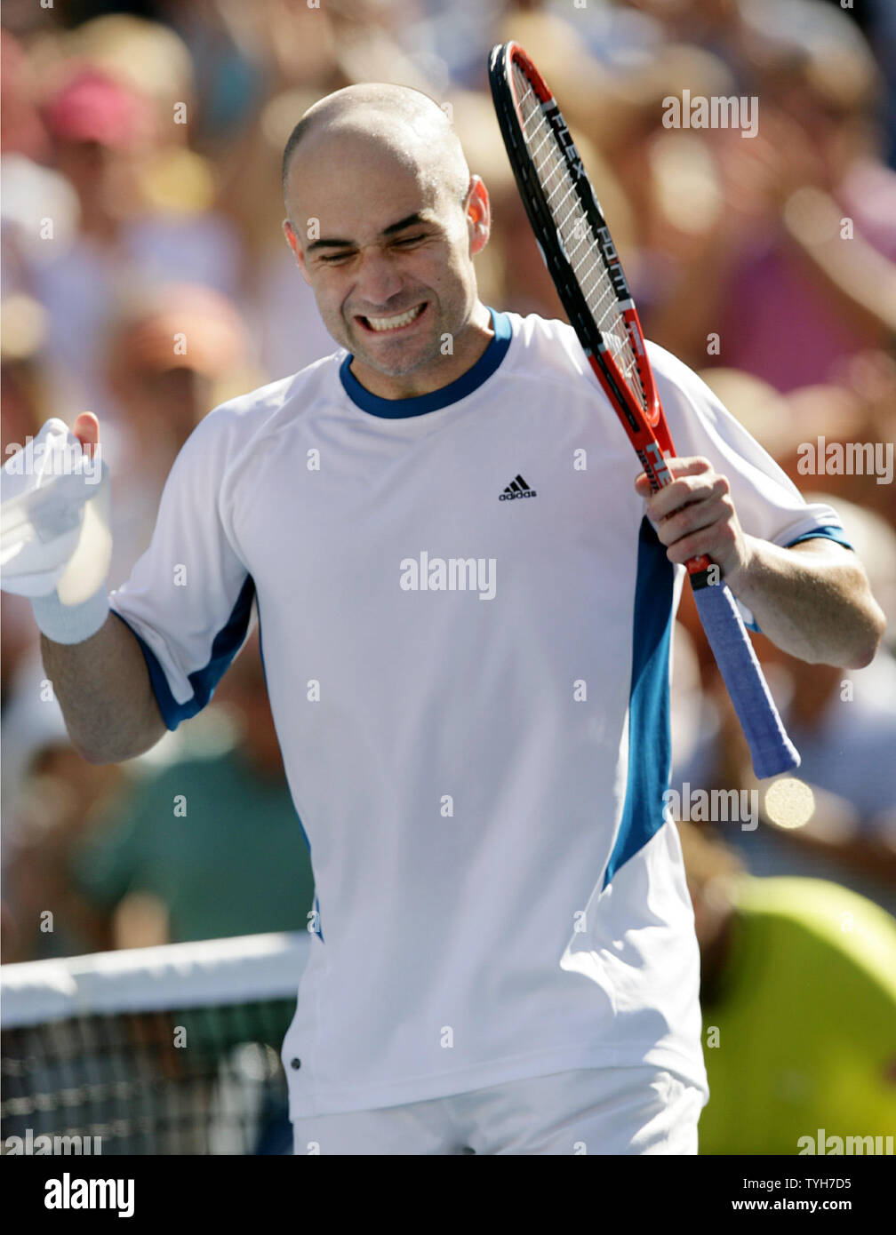 Andre Agassi (USA) reacts and raises his hands after his match against ...