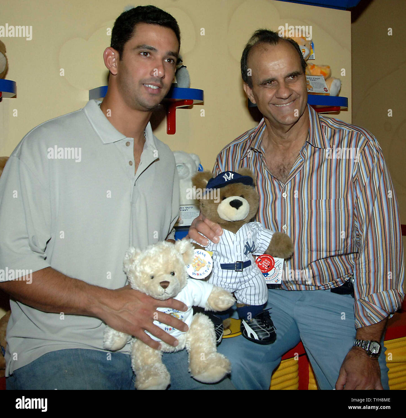 New York Yankee's manager Joe Torre poses with Yankee's catcher Jorge ...