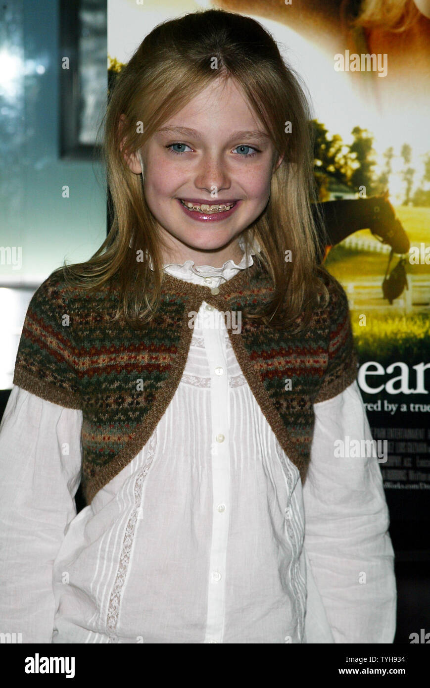 Dakota Fanning arrives for the premiere of "Dreamer" at the Chelsea ...