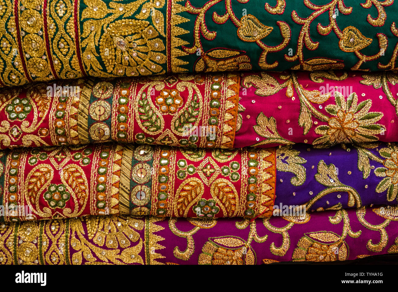 Folded saris in a sari shop, Pune, India Stock Photo - Alamy