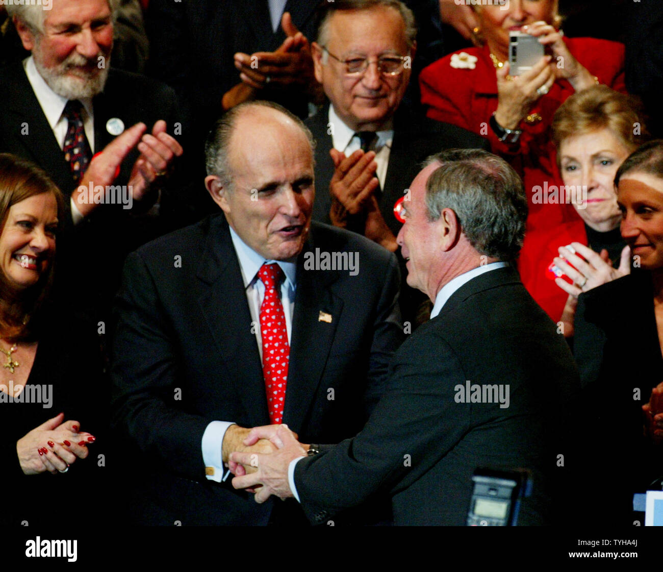 New York City Mayor Michael Bloomberg, right, greets former mayor Rudy ...