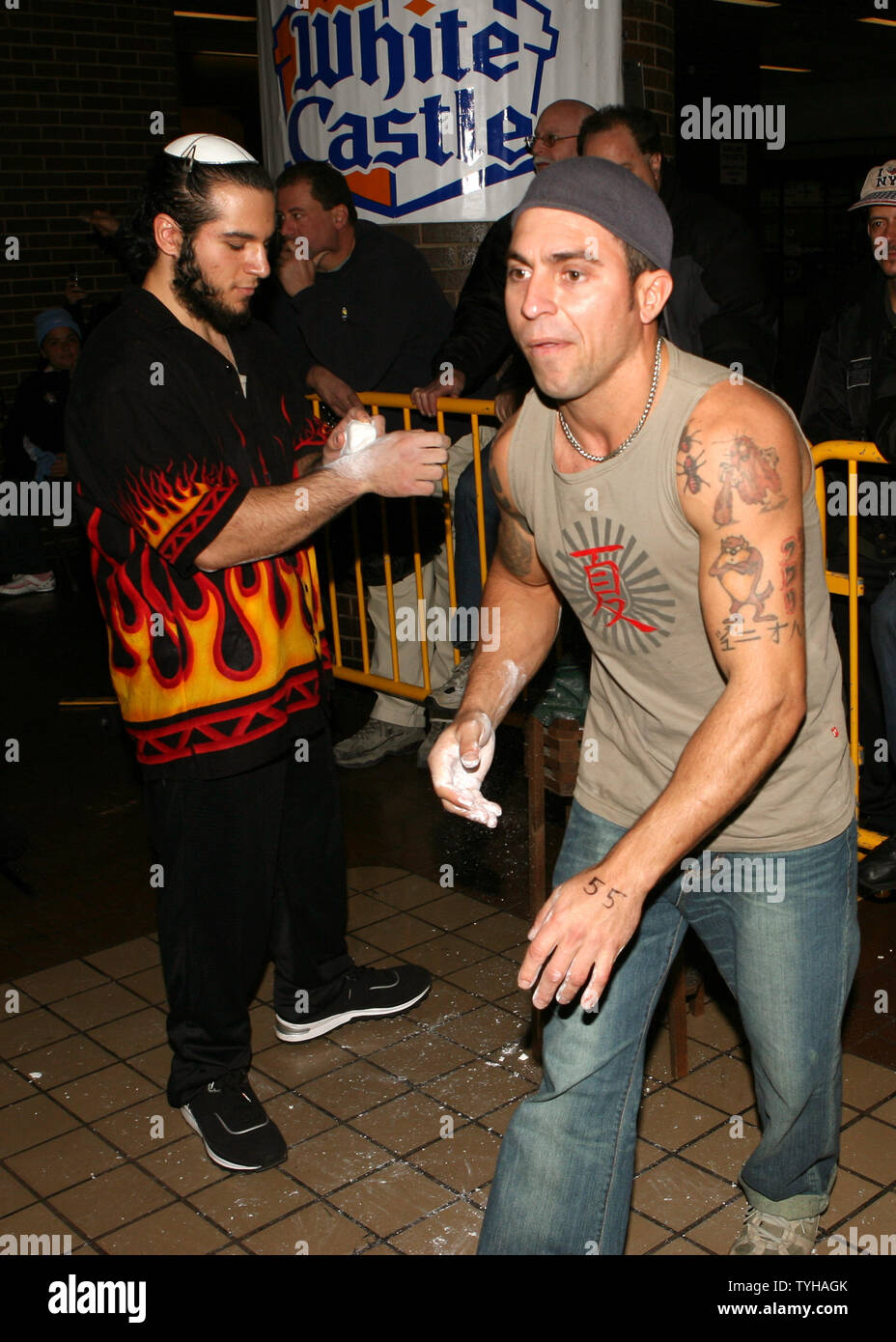 Flori Dutrce (R) and Gabriel Yak powder up for a match during an arm ...