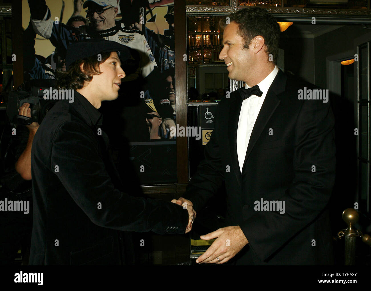 Gavin DeGraw and Will Ferrell shake hands during the red carpet ...