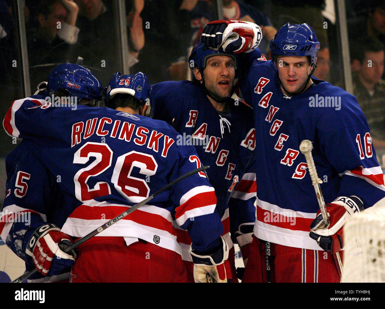 New York Rangers Steve Rucchin, Martin Rucinsky and Tom Poti celebrate ...