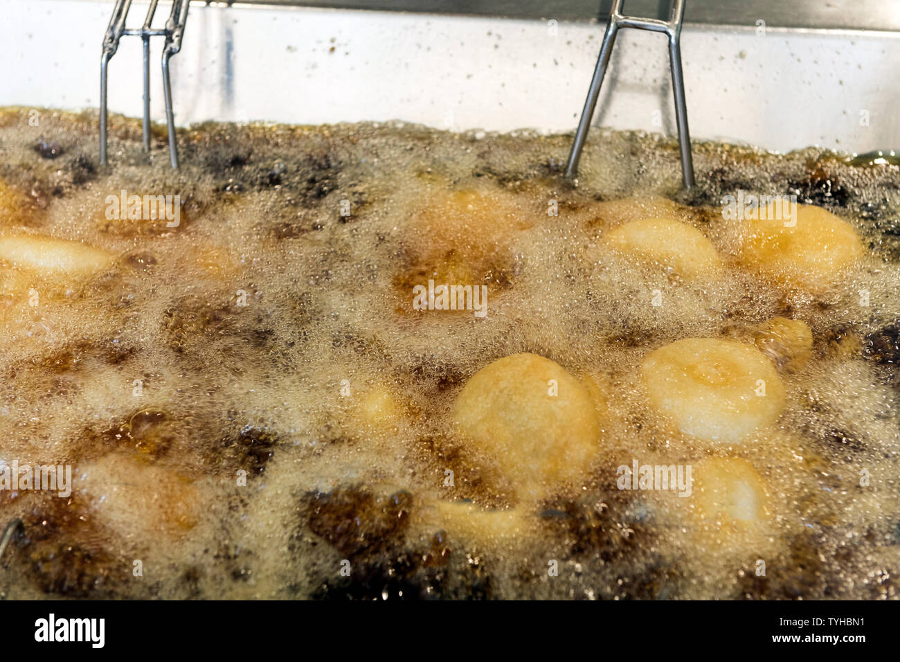 Ear to ear fried cake hi-res stock photography and images - Alamy
