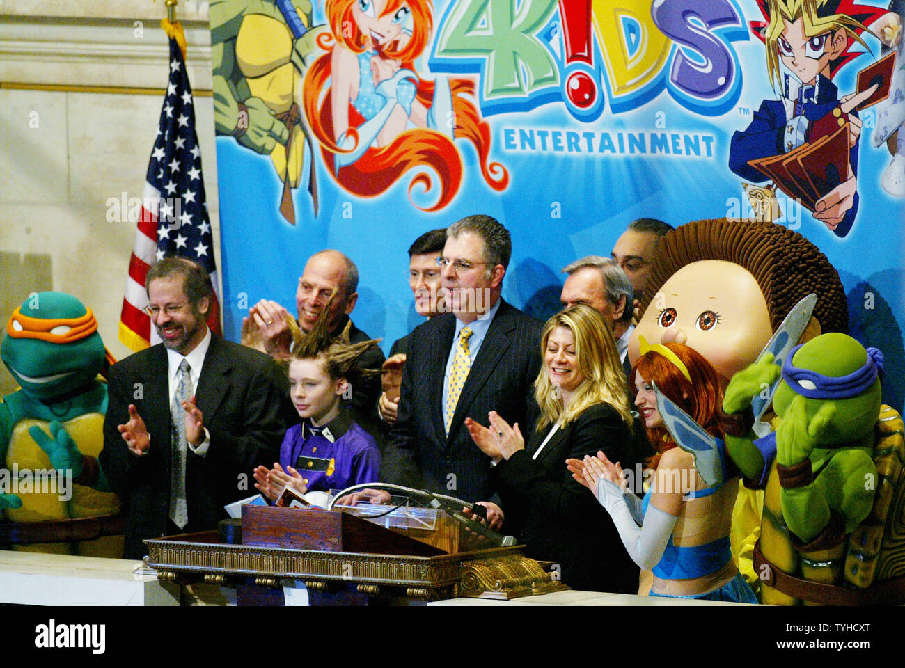 Alfred Kahn, center, chairman and CEO of 4 Kids Entertainment, is ...