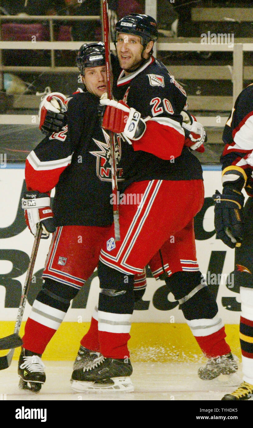 New York Rangers' Steve Rucchin, right, congratulates Martin Straka who ...