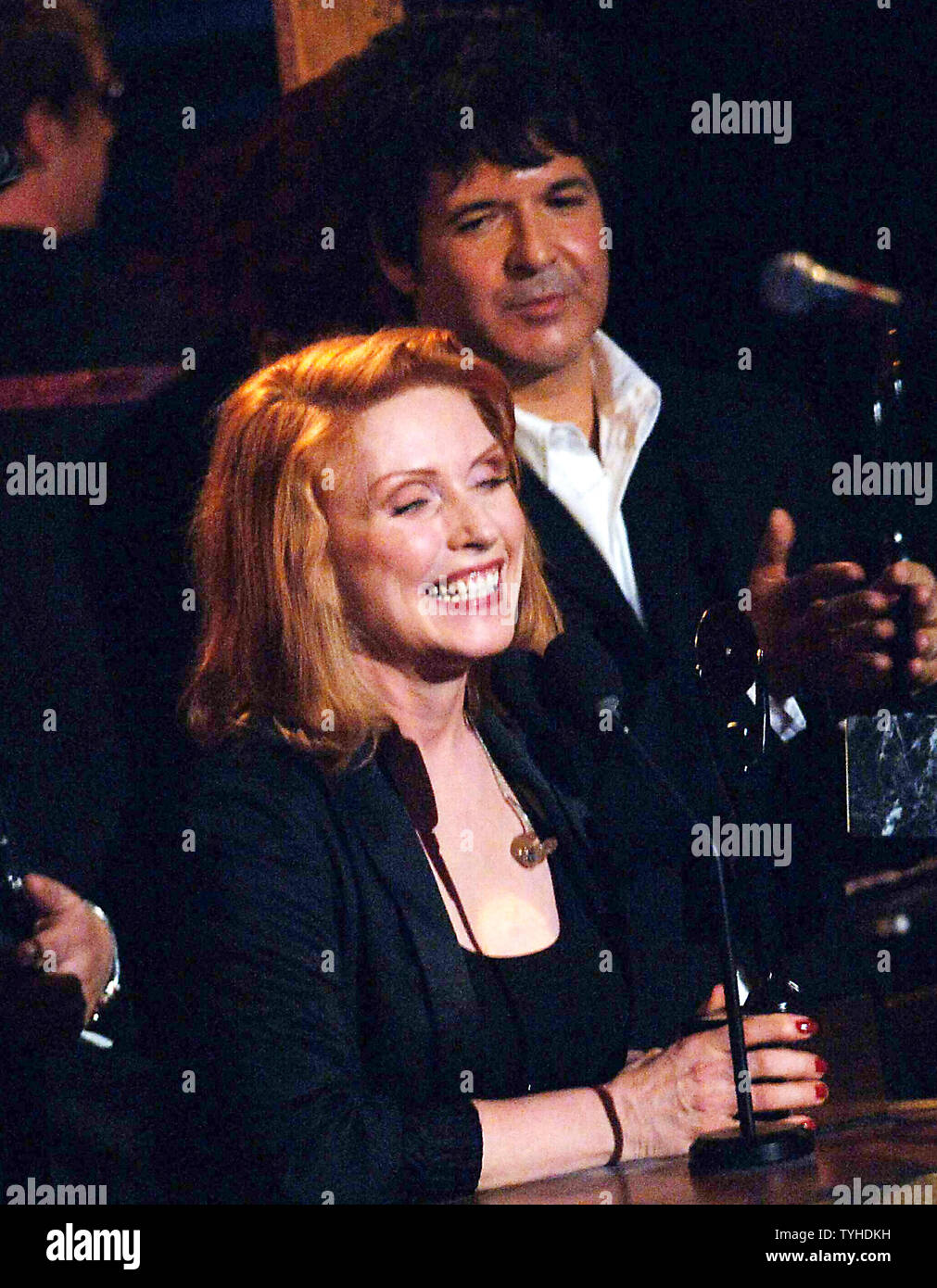 Debbie Harry, lead vocalist for the group Blondie, smiles after ...