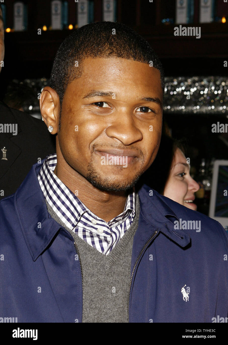 Usher smiles for pictures at the premiere of ATL at Tribeca Cinemas in ...