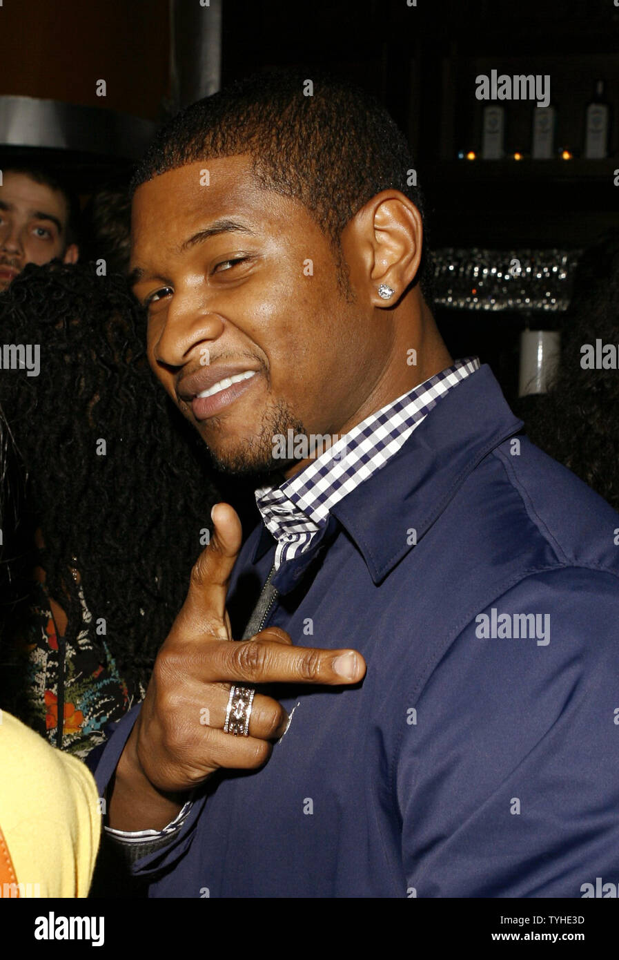 Usher smiles for pictures at the premiere of ATL at Tribeca Cinemas in ...