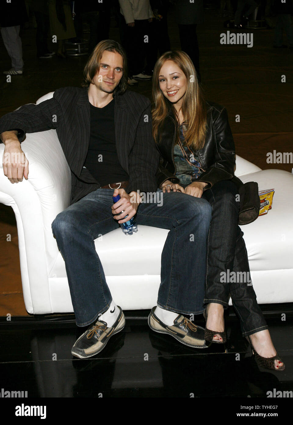 Autumn Reeser and companion Jesse smile for pictures while sitting ...