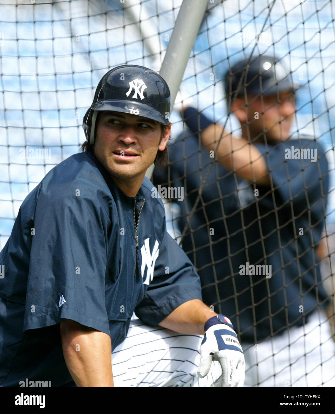 New York Yankees Johnny Damon waits for Derek Jeter to finnish his ...