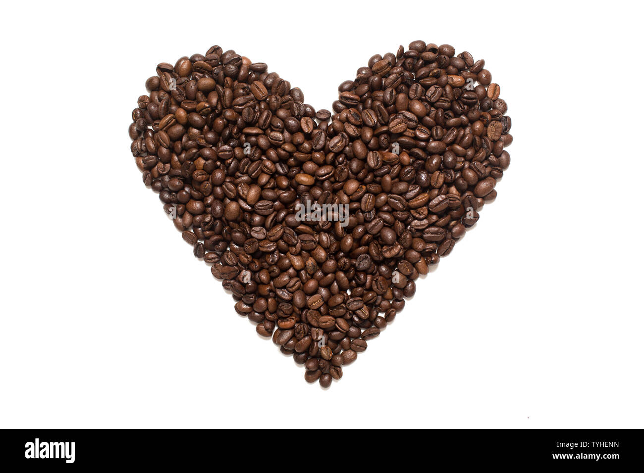 Coffee beans heart shape. Isolated on white background Stock Photo - Alamy