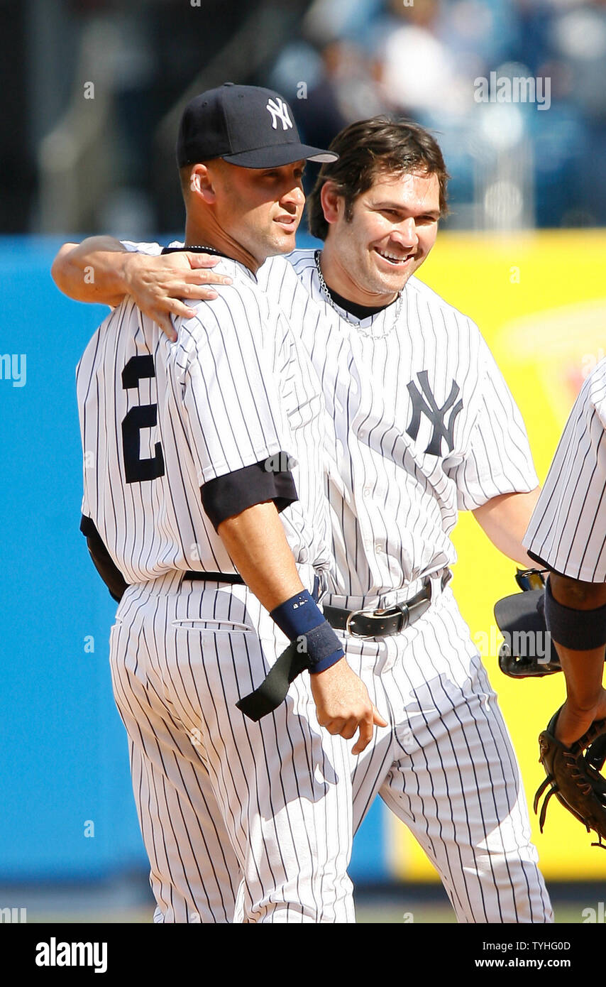 New York Yankees Johnny Damon and Derek Jeter embrace after the game at ...