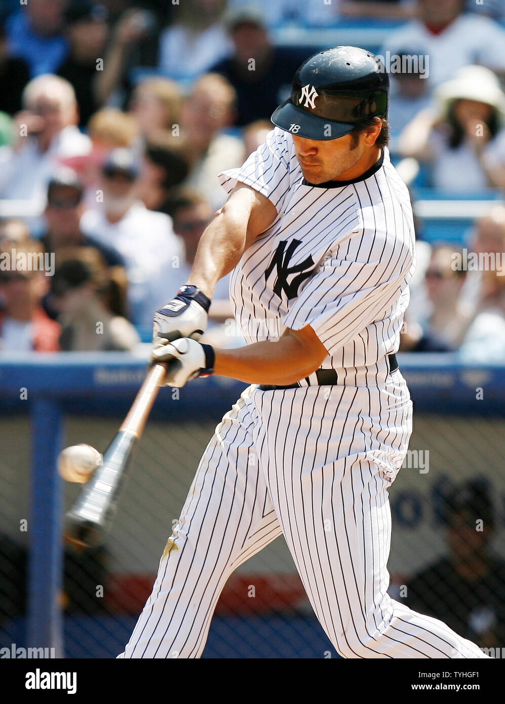 New York Yankees Johnny Damon connects and hits the ball far and foul ...