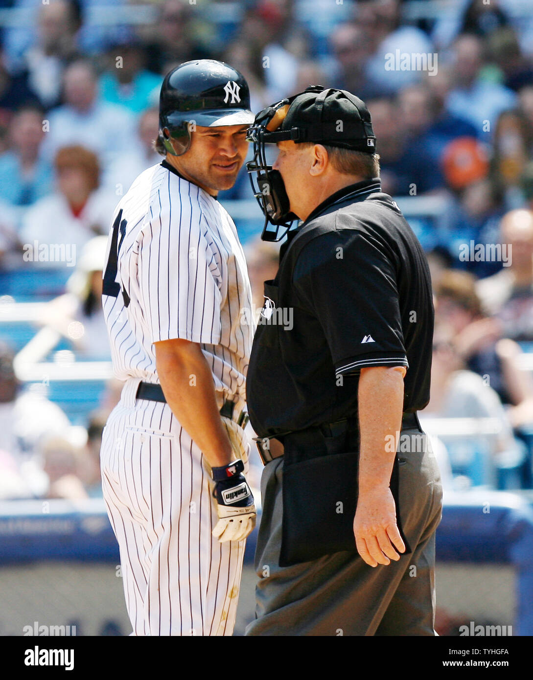 New York Yankees Johnny Damon has words with the umpire after striking ...