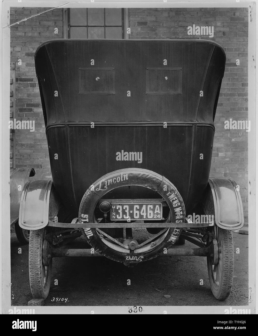 Rear view of cars; Scope and content: License plates are from Minn ...