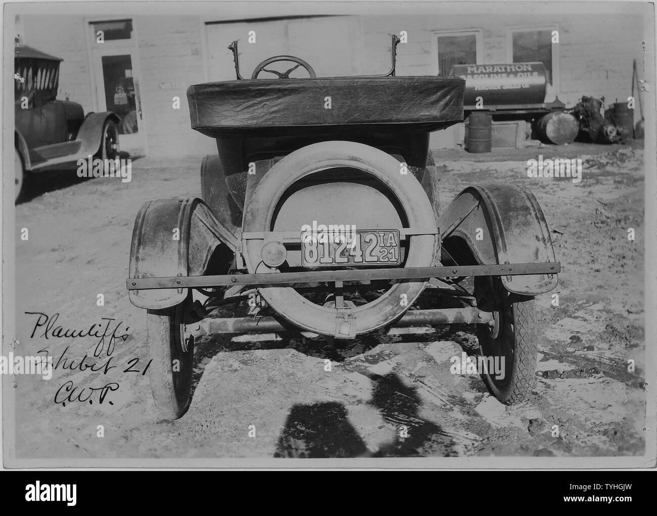 Rear view of cars; Scope and content: License plates are from Minn ...