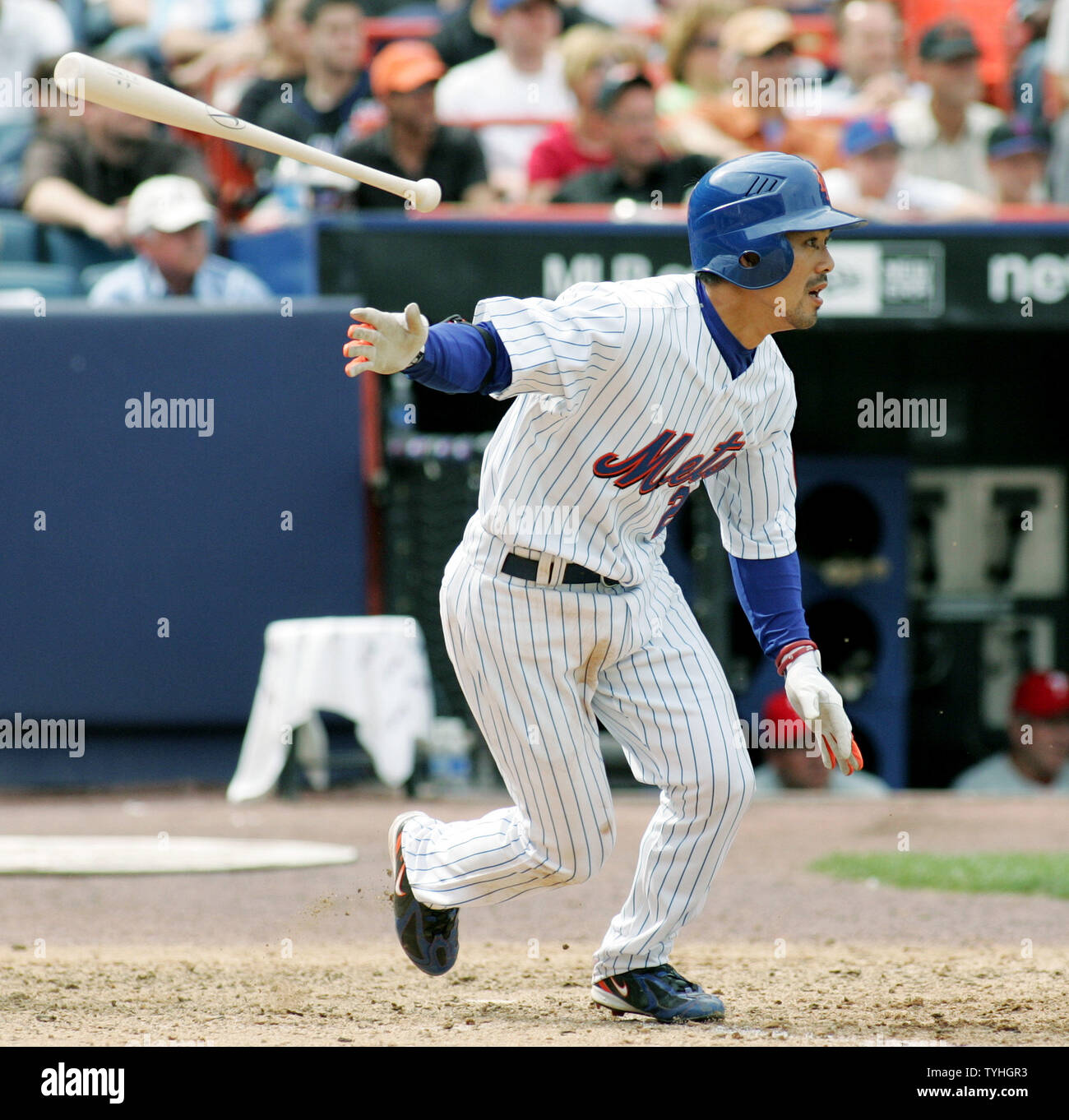 New York Mets' Kazuo Matsui hits one shallow and goes on to make the ...