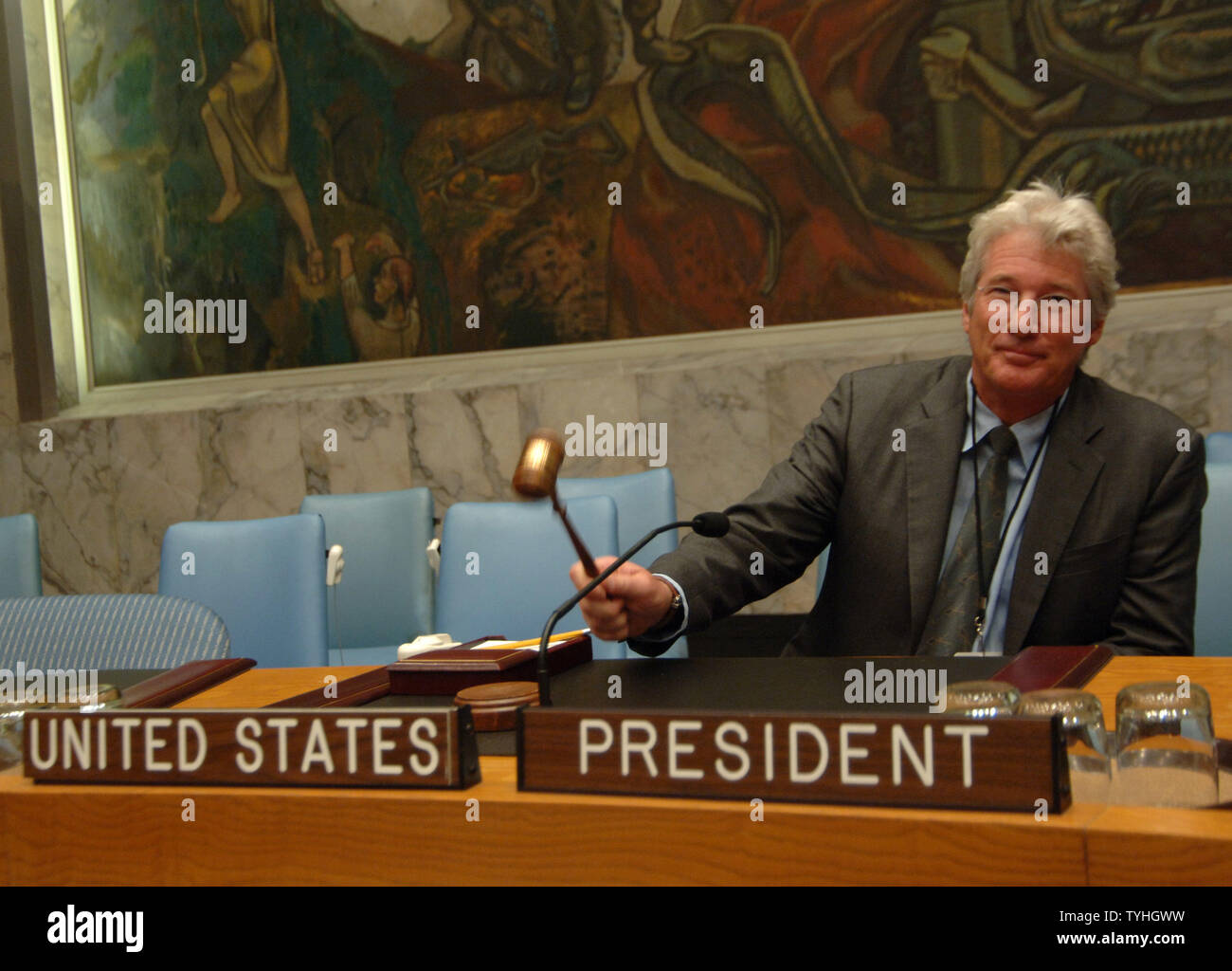 UN Goodwell Ambassador for UNICF actor Richard Gere tries out the head ...