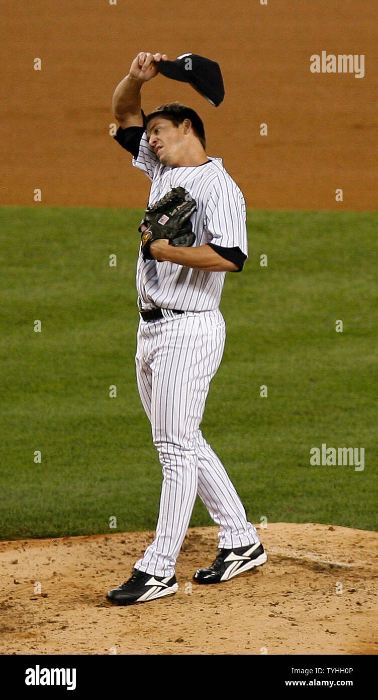 New York Yankees pitcher Scott Proctor reacts after giving up a three ...