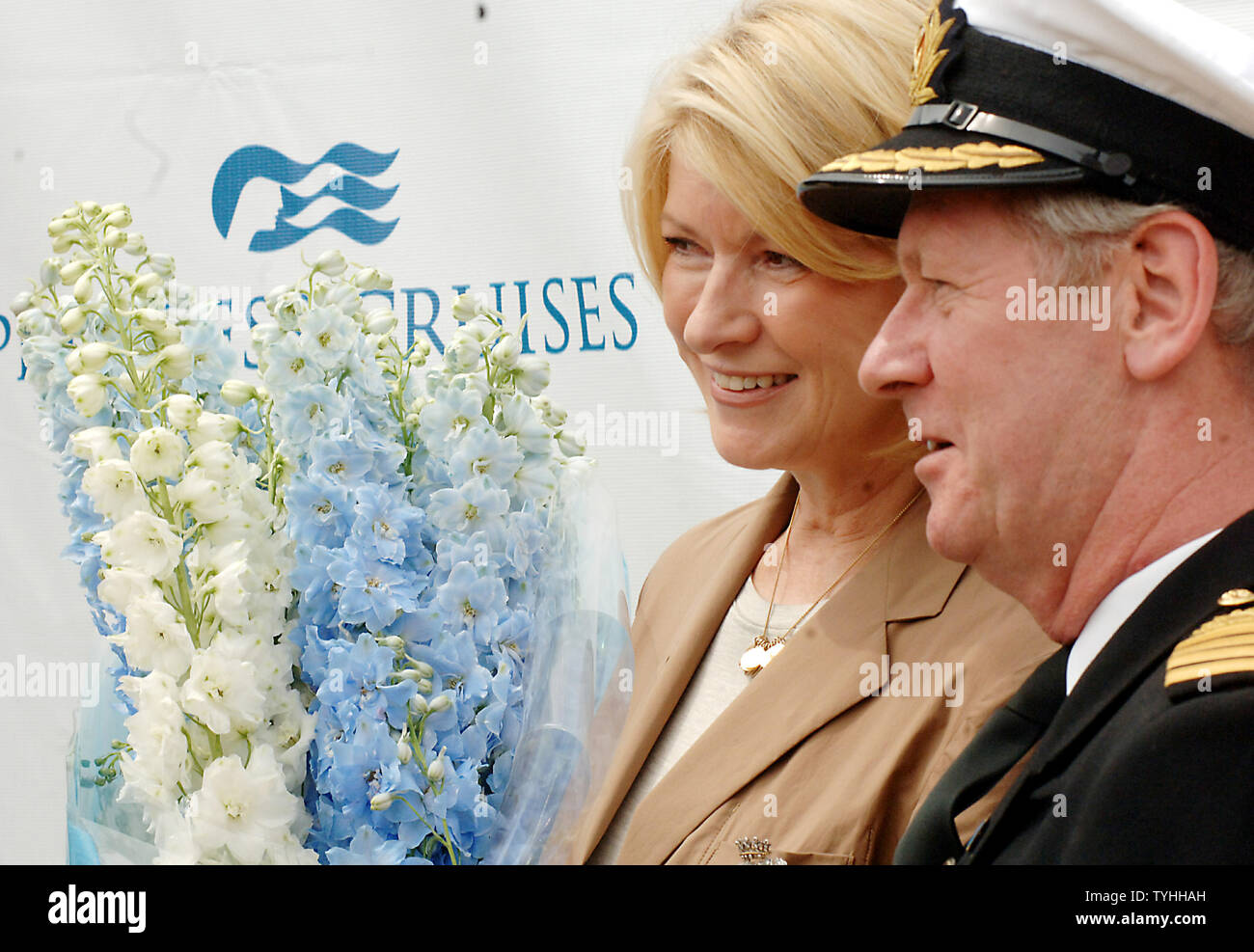 Martha Stewart relaxes with ship Captain Andrew Proctor after taking ...