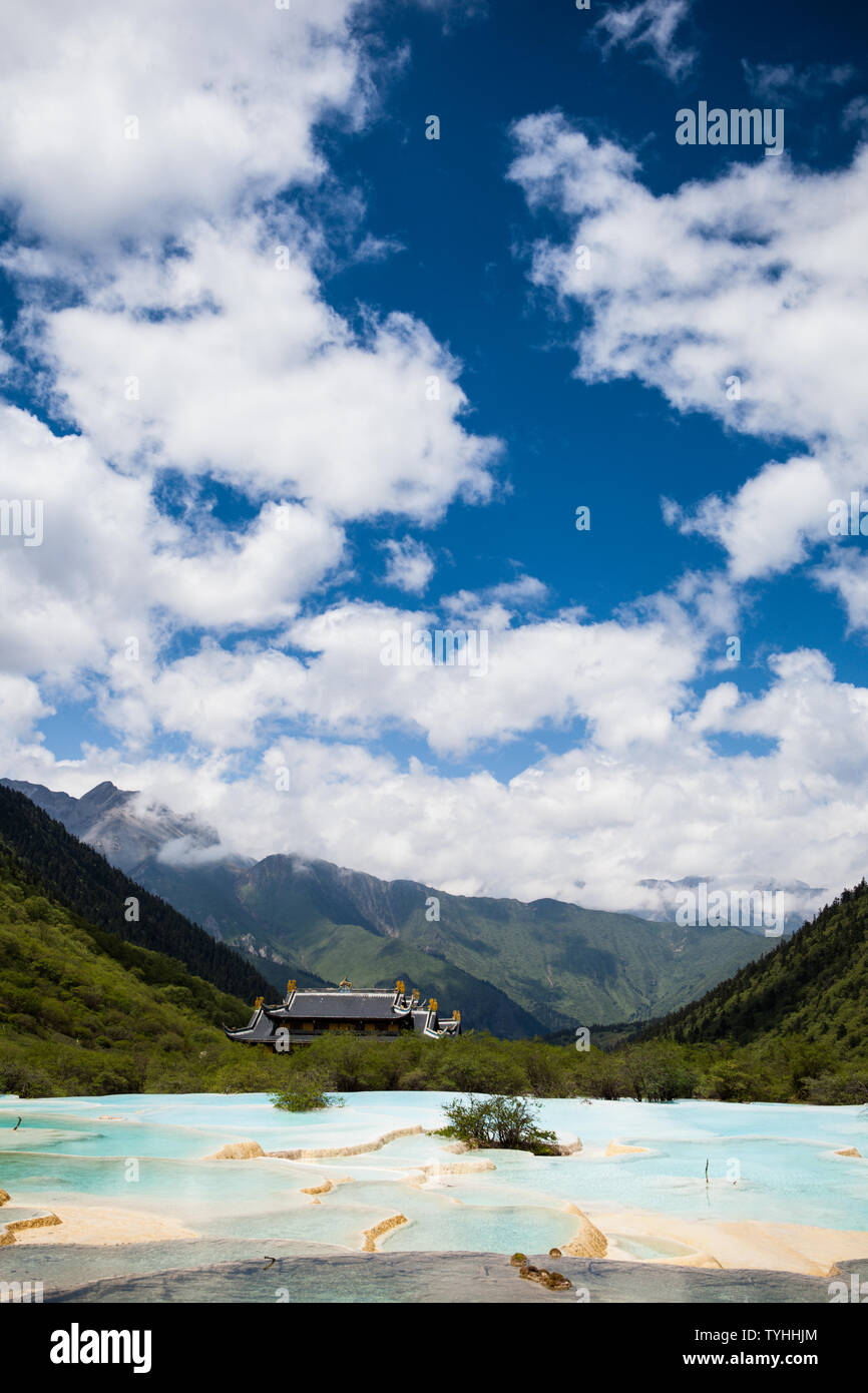 Majestic trees and tall landforms and terrain and daylight landmarks hi ...