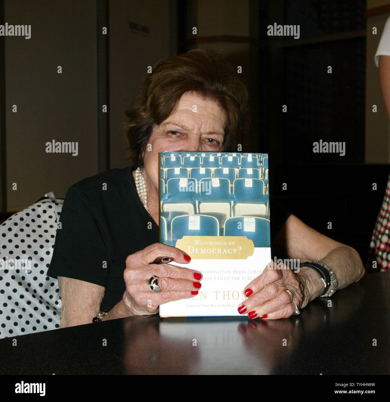 Helen Thomas signs copies of her new book ""Watchdogs of Democracy? The ...