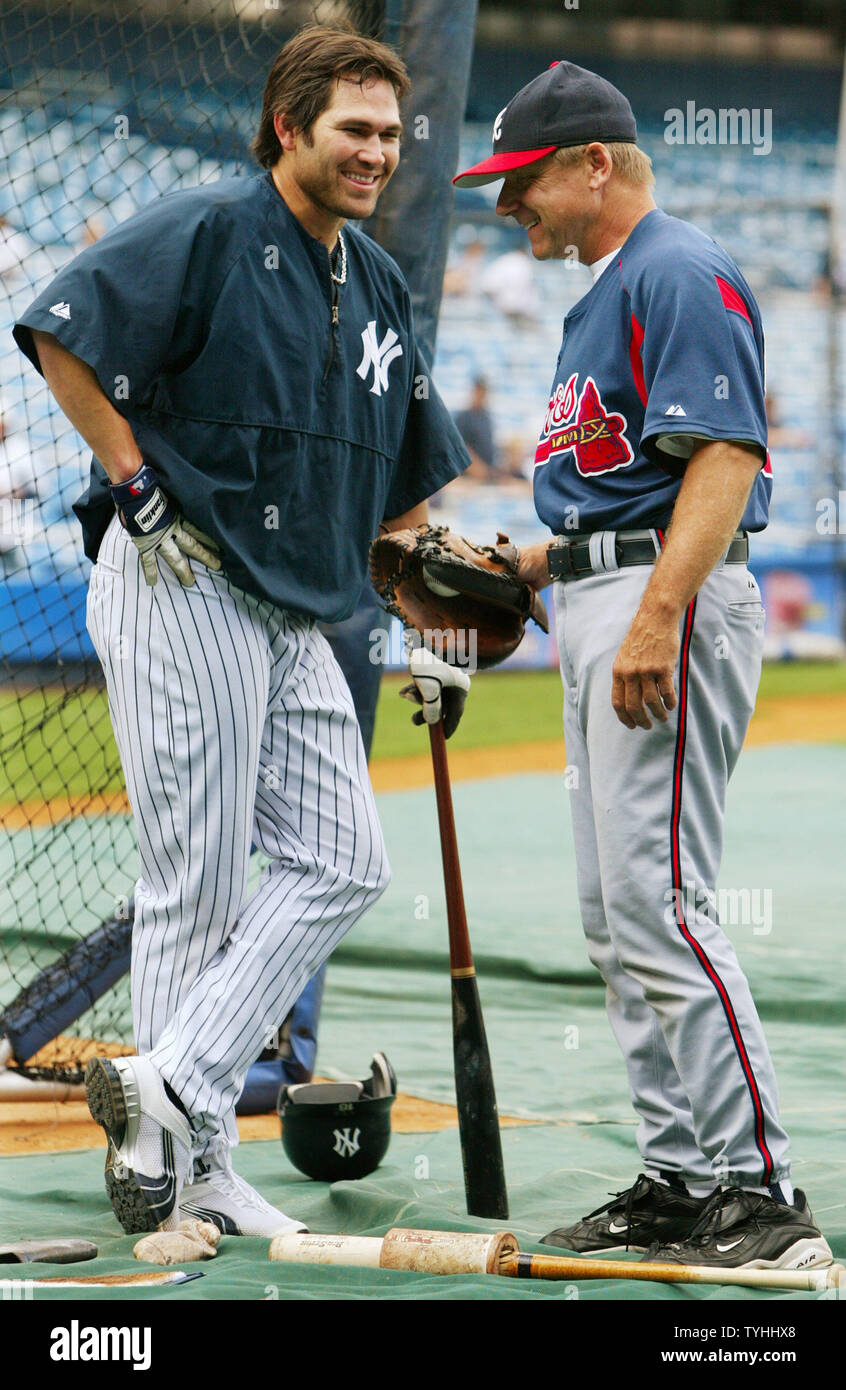 New York Yankee's Johnny Damon, left, talks with Frank Fultz, strength ...