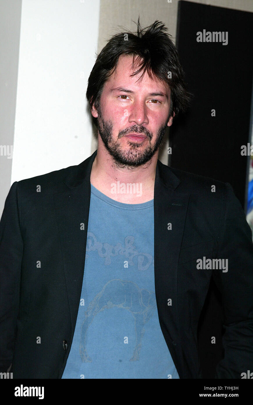Keanu Reeves arrives for the premiere of his new movie "A Scanner ...