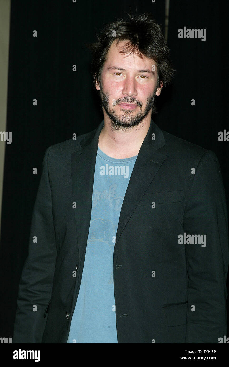 Keanu Reeves arrives for the premiere of his new movie "A Scanner ...