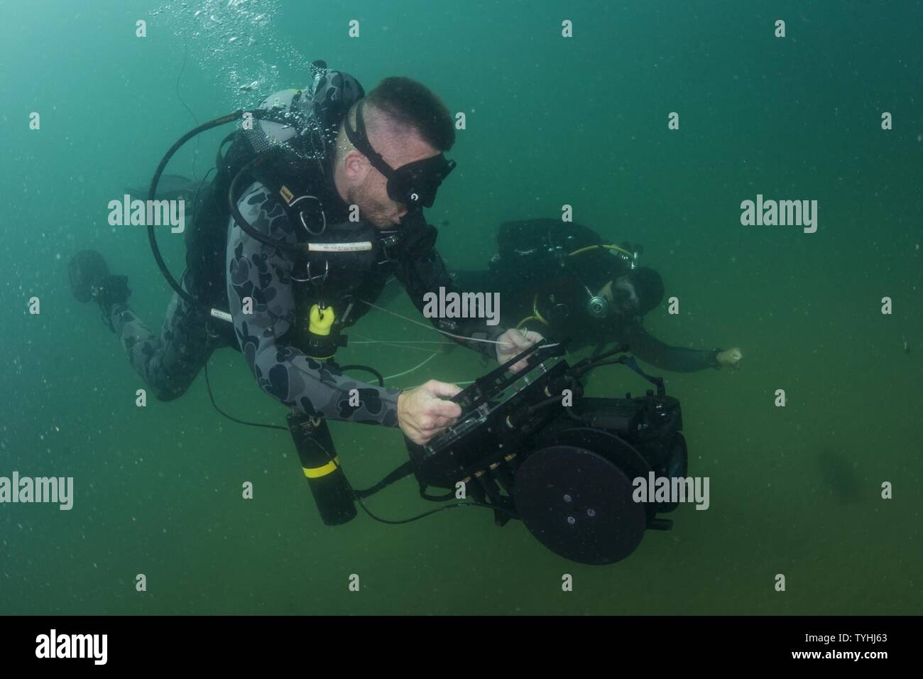 Chief Petty Officer Albert Alejo, assigned to Mobile Diving Salvage ...