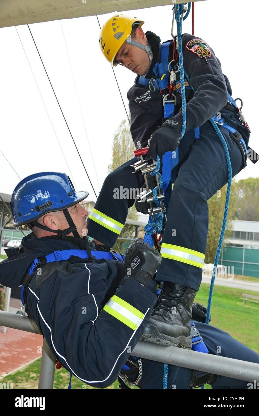 Firefighters Andrea Biasio and Federico Concordia assigned to the U.S ...